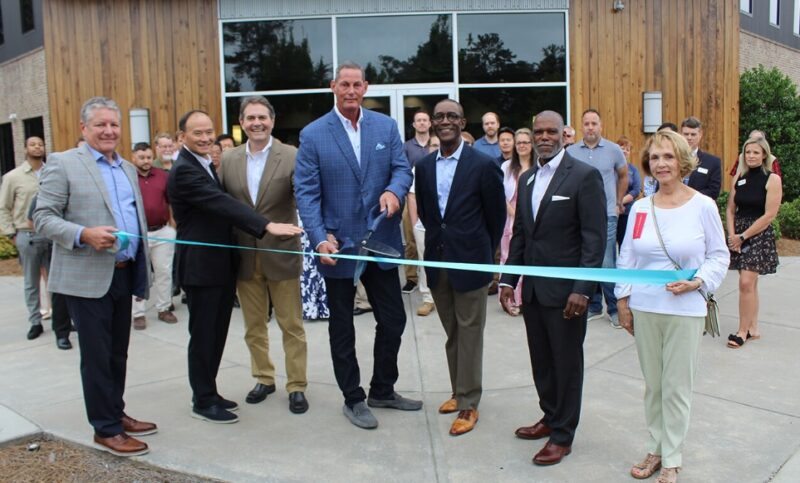 Koppers Performance Chemicals Cuts Ribbon - NADRA